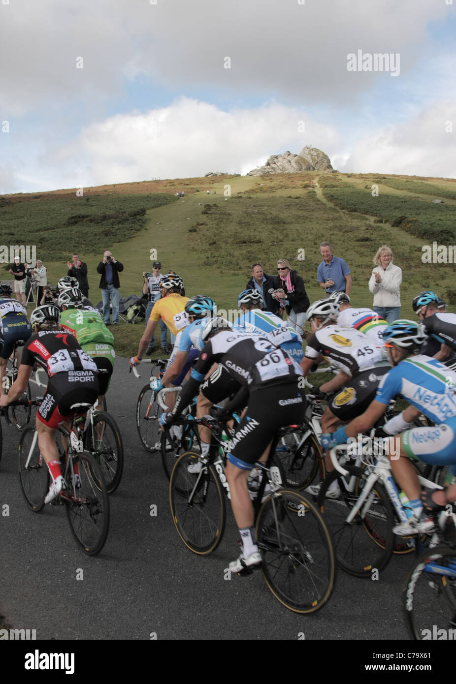 Leader in yellow jersey Riders climb Haytor on Exeter to Exmouth Stage ...