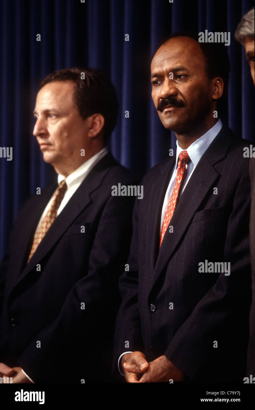 Franklin Raines with Lawrence Summer during a news conference Stock ...