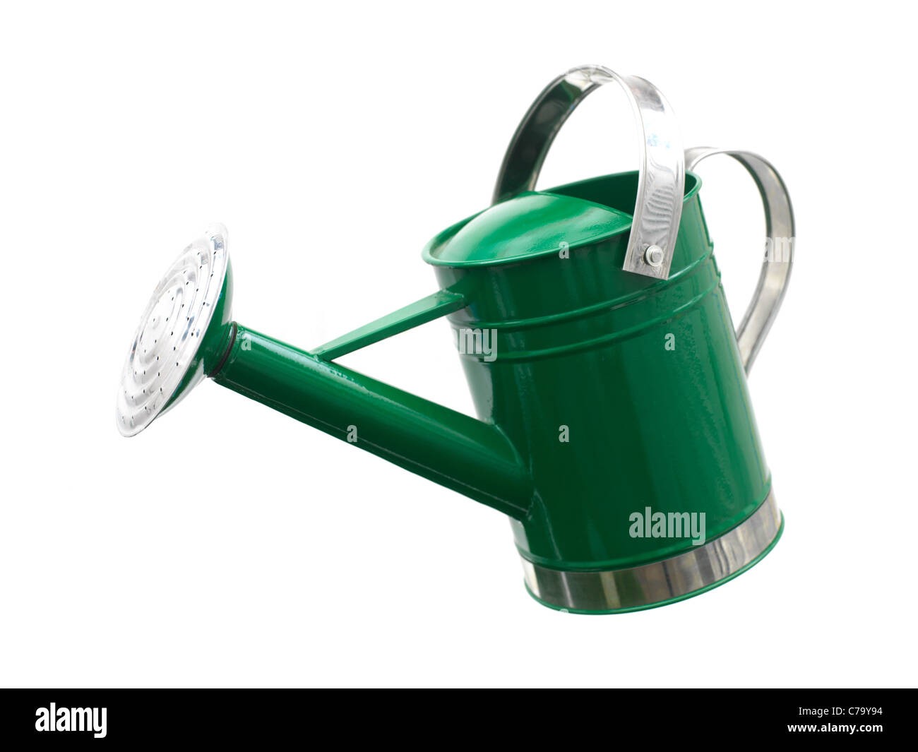 A watering can isolated against a white background Stock Photo - Alamy
