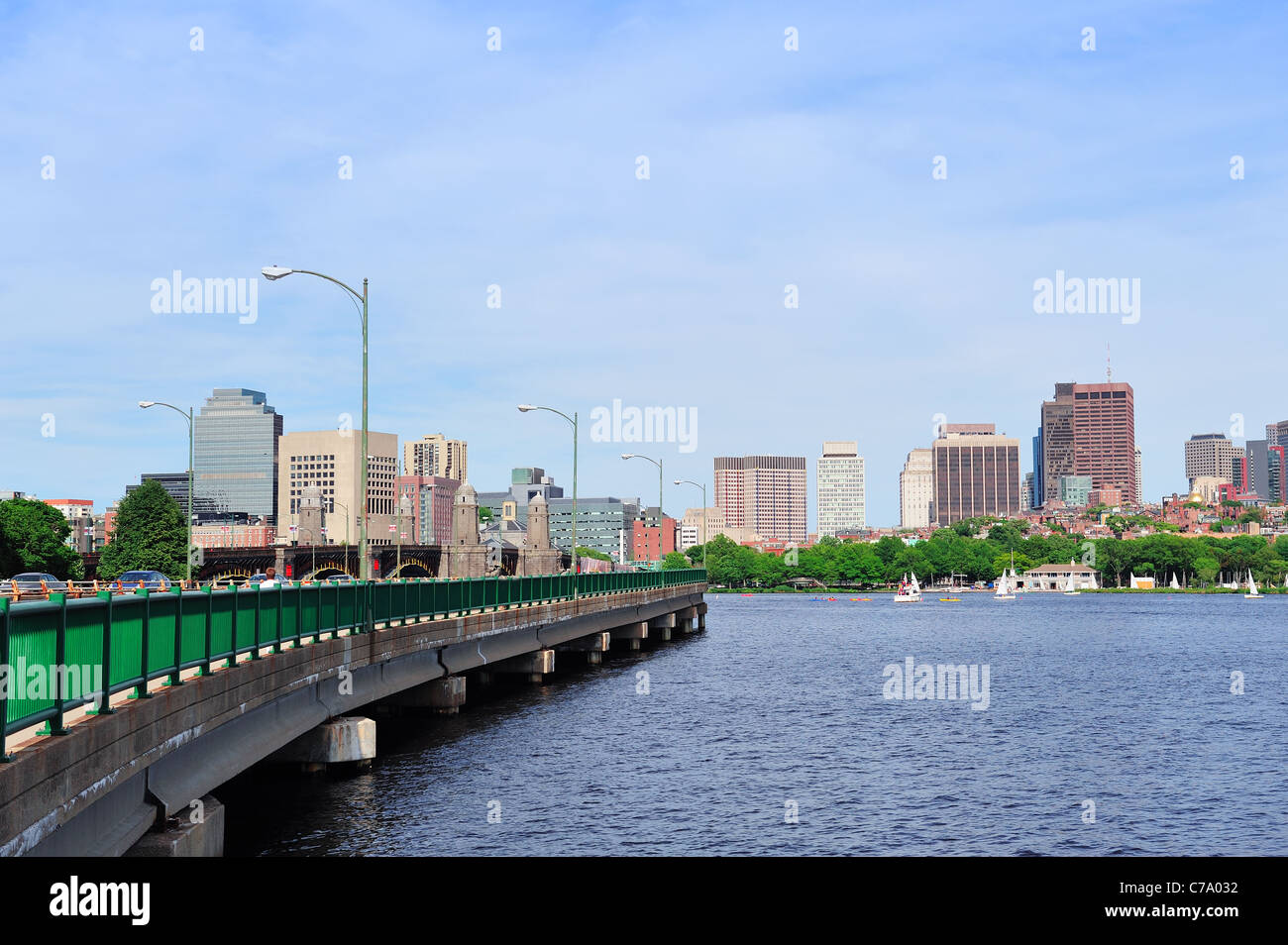 Boston skyline panorama over Charles River with boat, bridge and urban ...