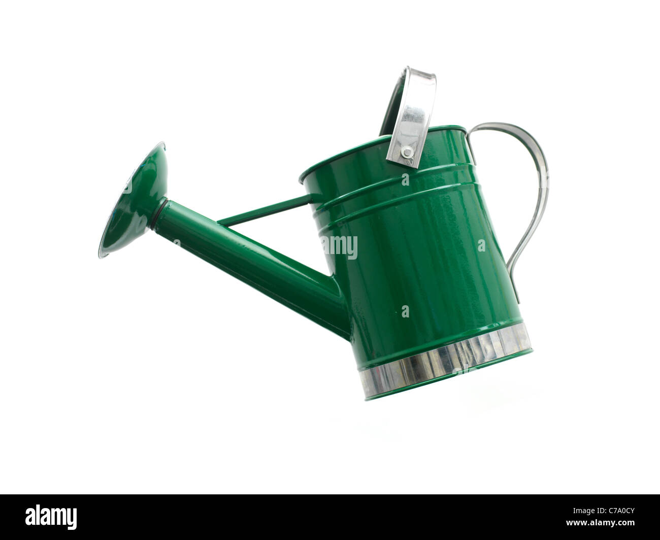 A watering can isolated against a white background Stock Photo - Alamy