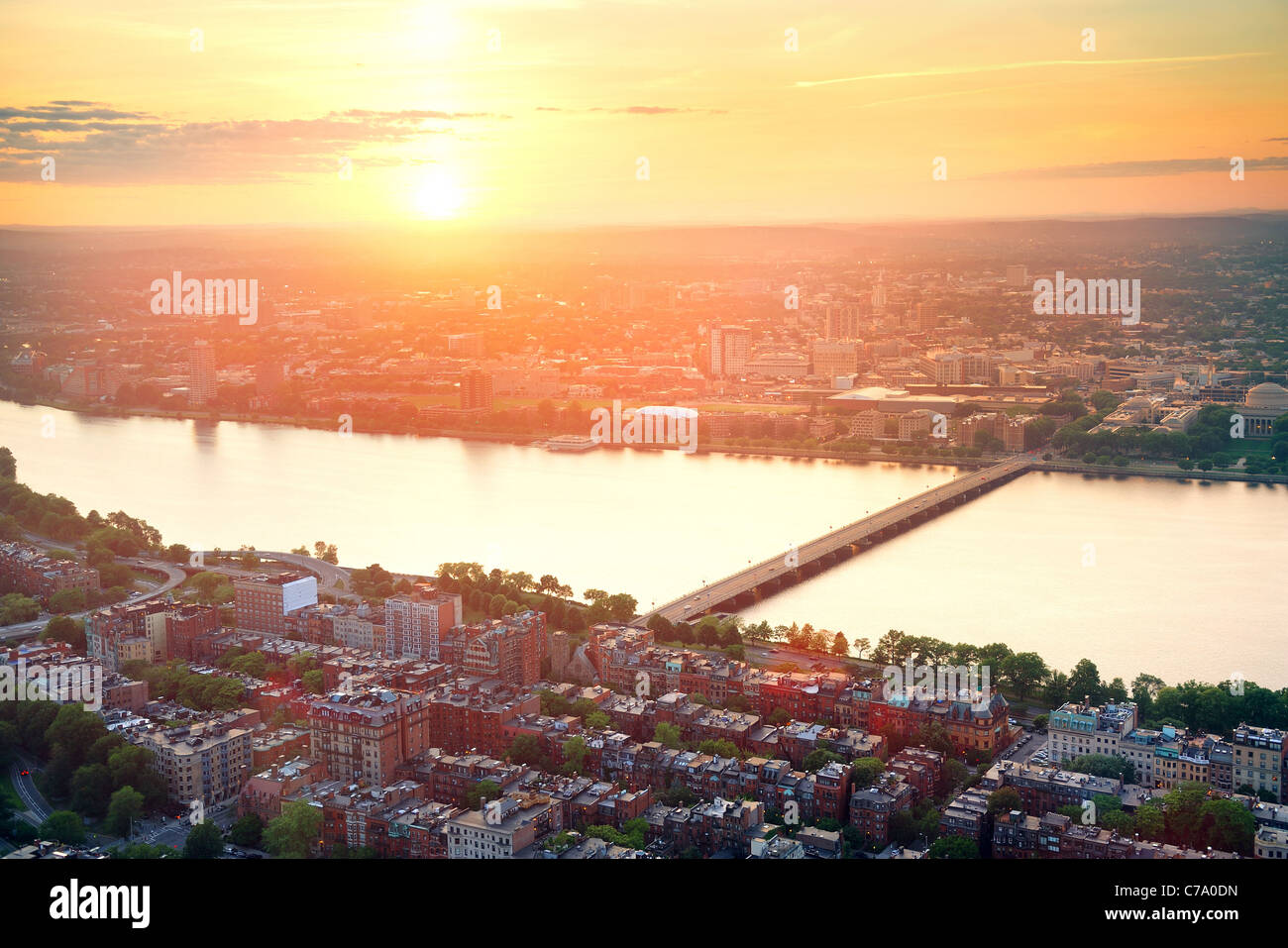 Boston Charles River sunset aerial view with urban buildings and bridge ...