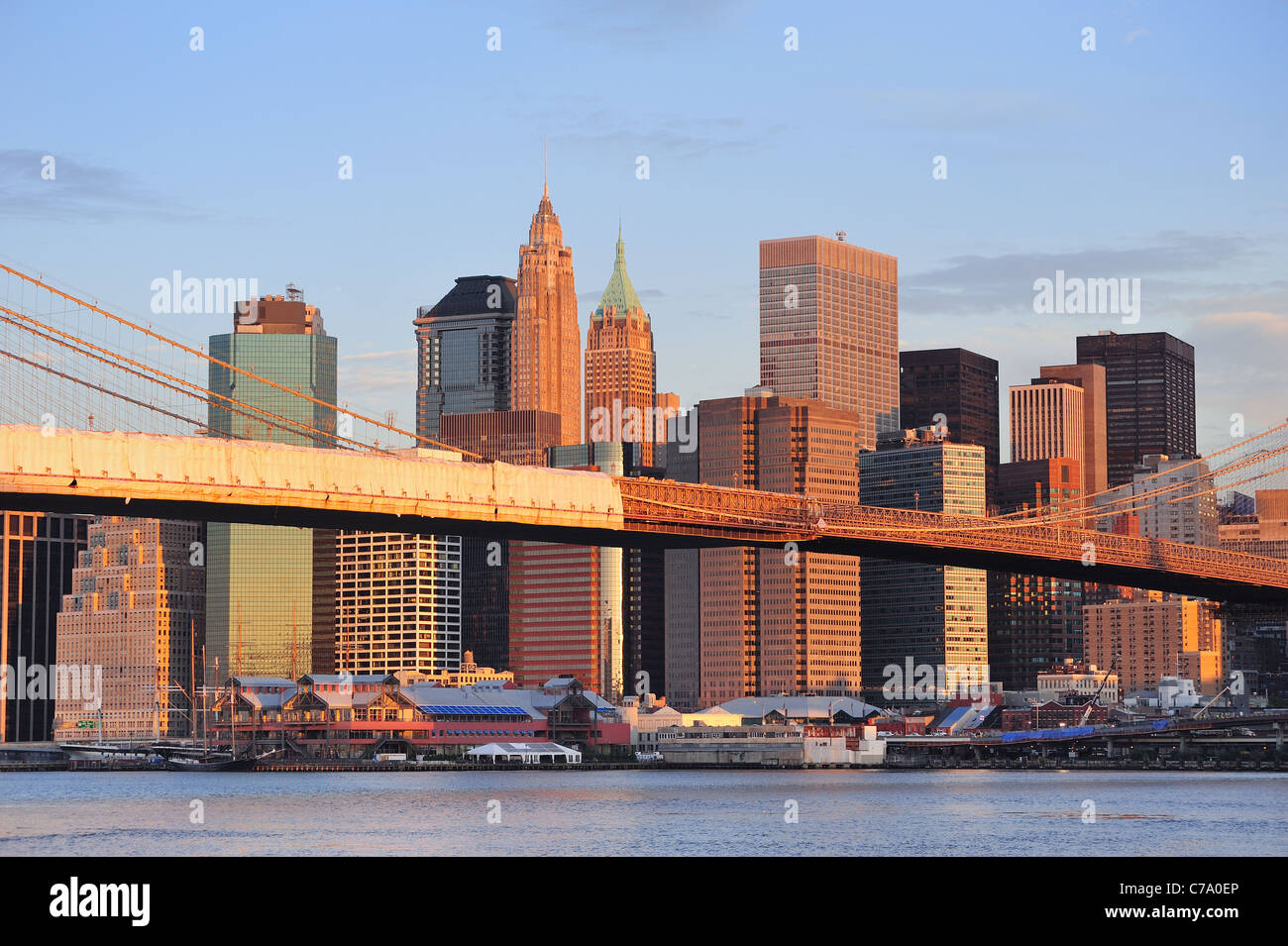 Brooklyn Bridge with lower Manhattan skyline in the morning with ...