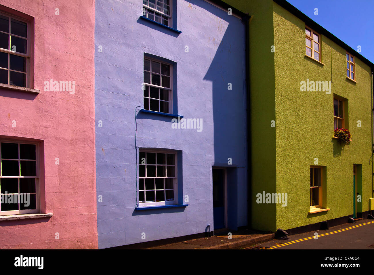 Terrace of pastel coloured houses in Lyme Regis in Dorset, England ...