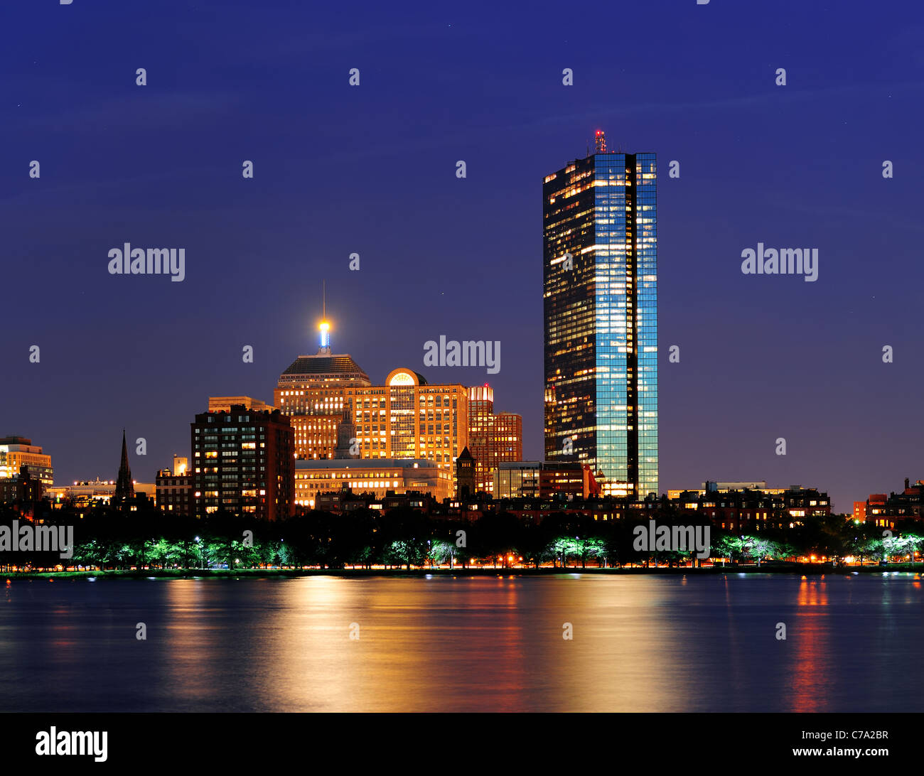 Boston Charles River at dusk with urban city skyline and light ...
