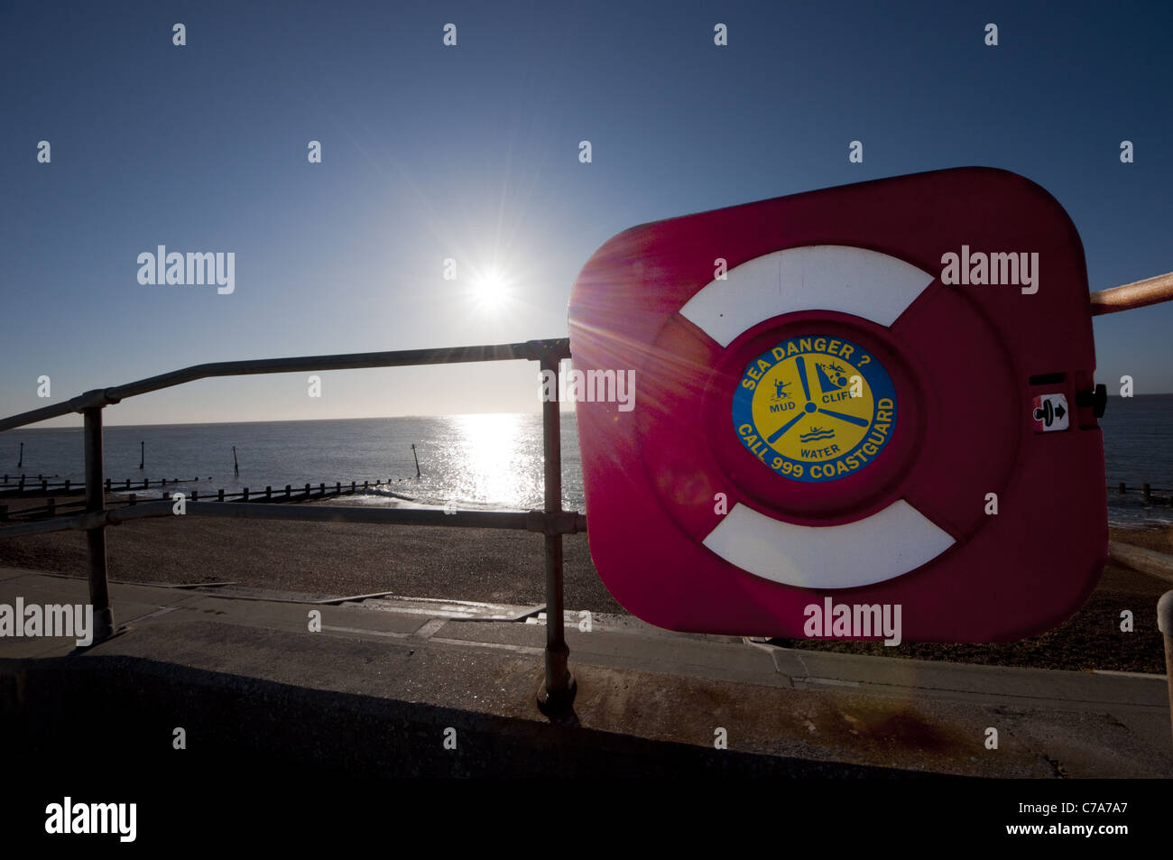 Lifebelt on sea front emergency life belt Stock Photo - Alamy