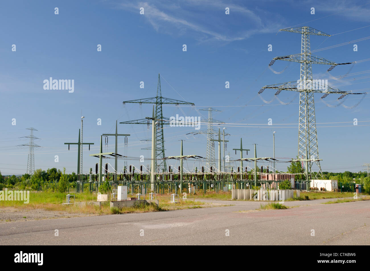 Electricity pylons at a power plant of the E.ON energy corporation ...