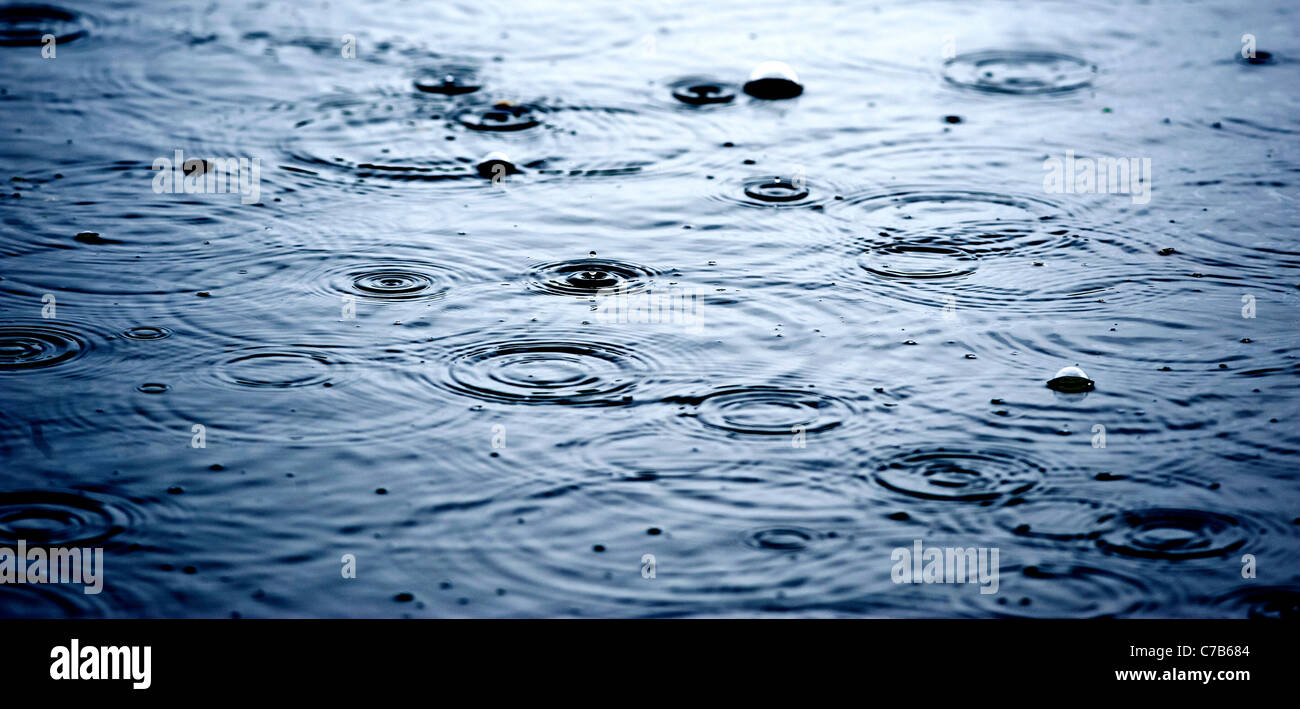 Shower[WOP] untimely creating circular ripples on Salt Lake water ...
