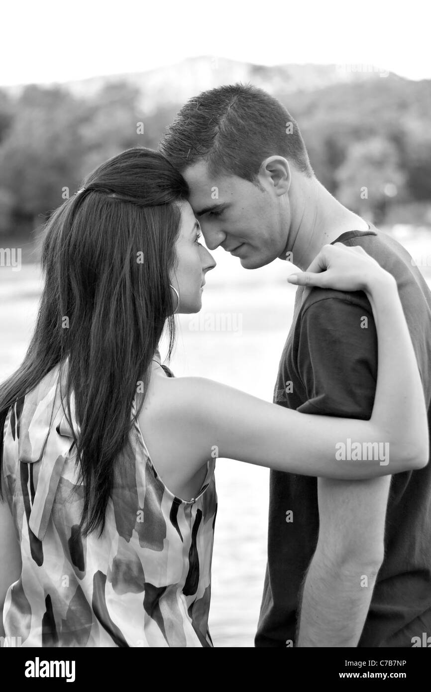 Young man woman talking together Black and White Stock Photos & Images ...
