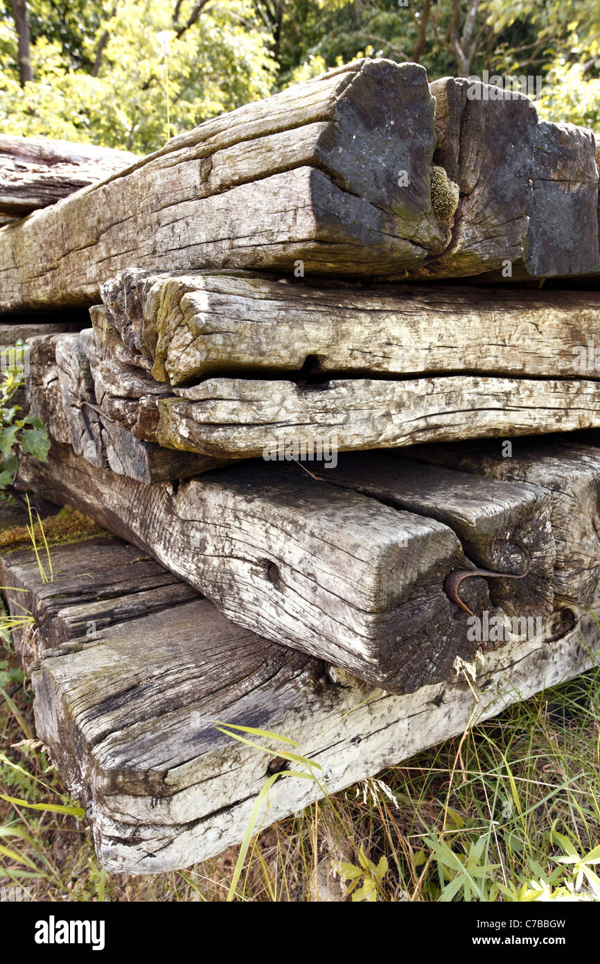 A pile of old, used, wooden railway sleepers Stock Photo - Alamy