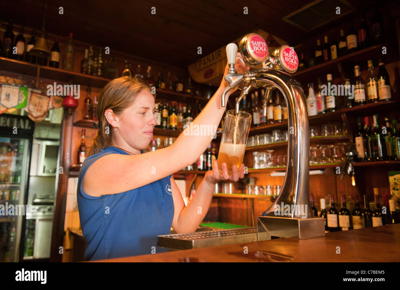 Pouring another beer, Peter's Cafe Sport, Horta, Faial, Azores ...