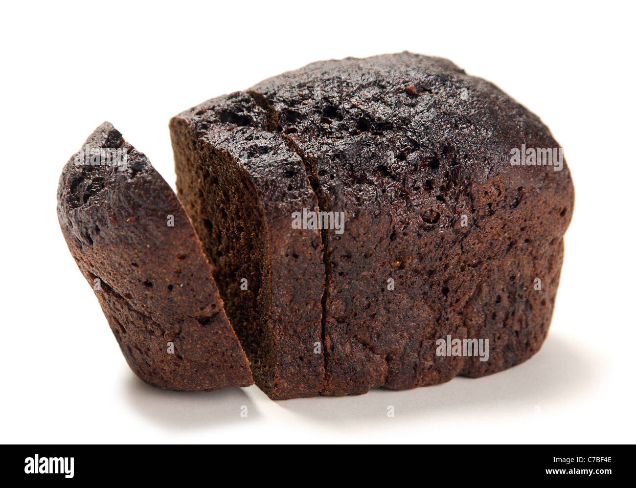 Black bread loaf closeup on white background Stock Photo - Alamy