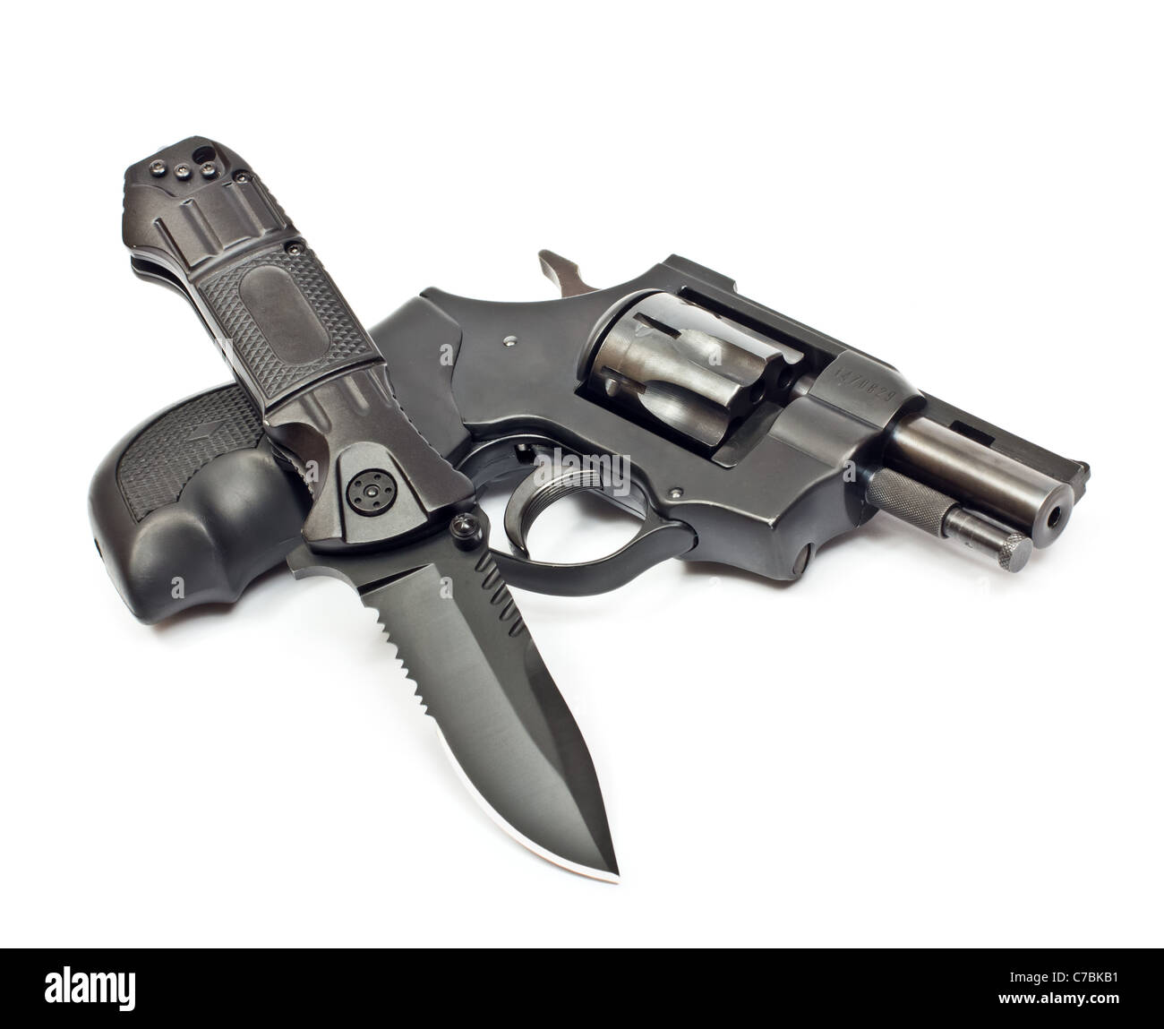 Knife and revolver. Isolated on white background Stock Photo - Alamy