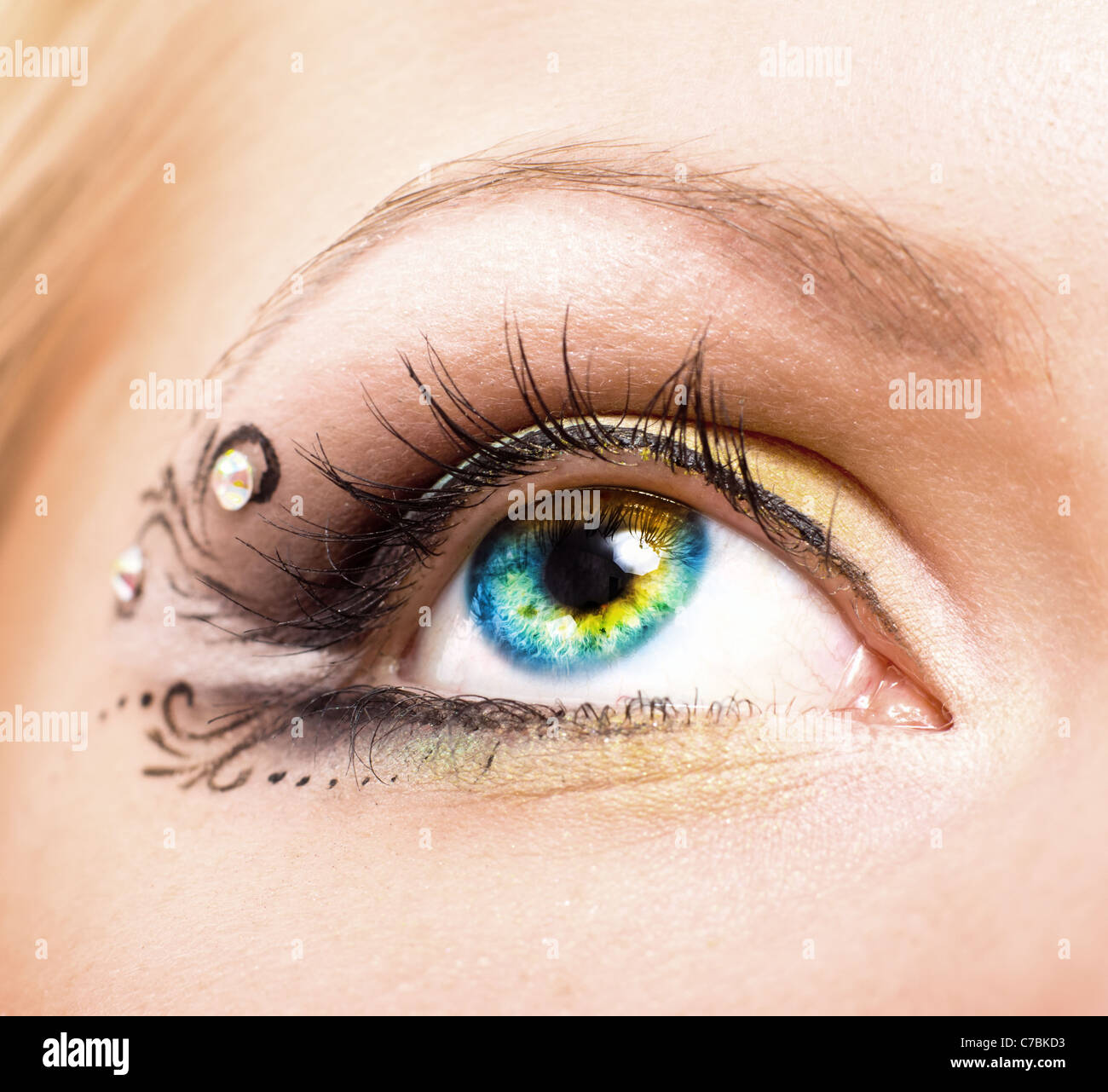 Close up Colourful human eye with makeup. Beauty and fashion Stock ...