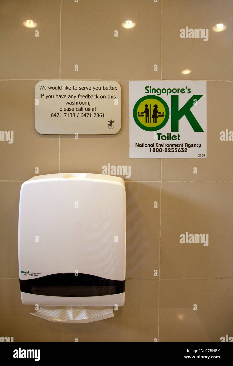 Clean hand towels and signs in a Singapore public washroom, Singapore ...