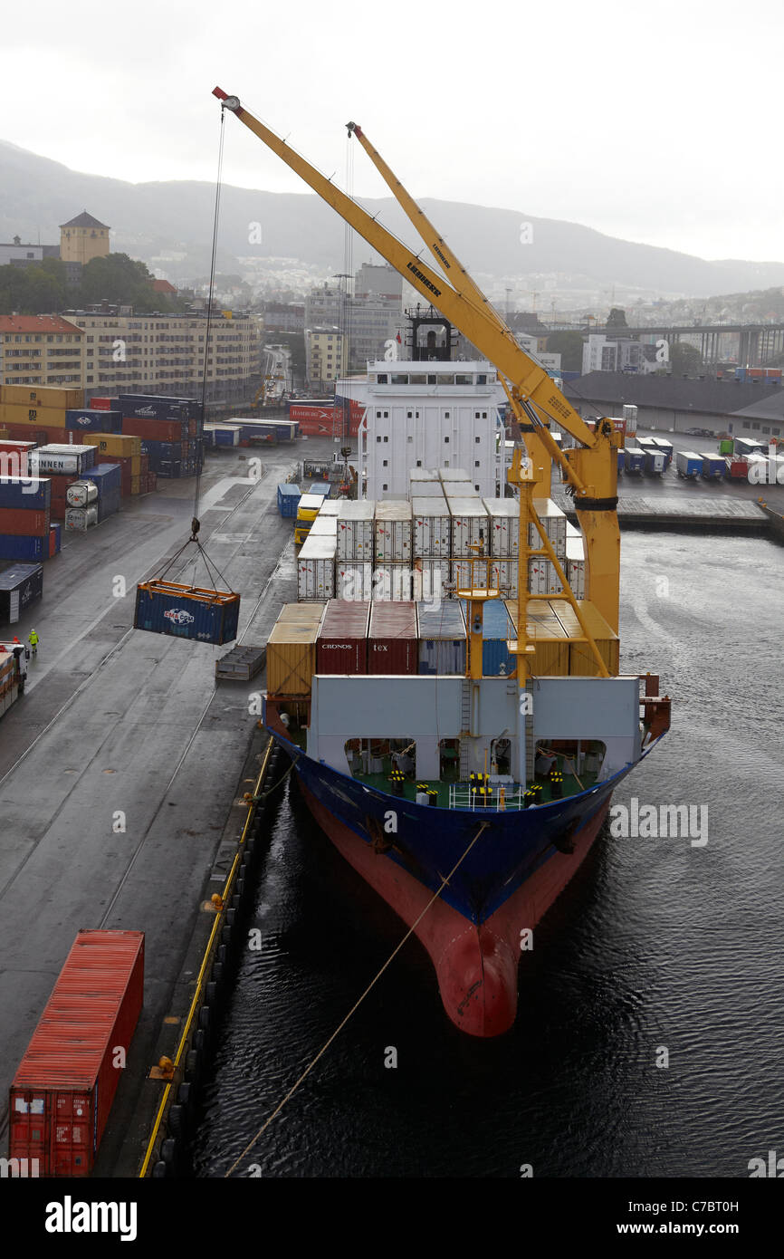 Freight containers being loaded onto the cargo container ship, MV ...