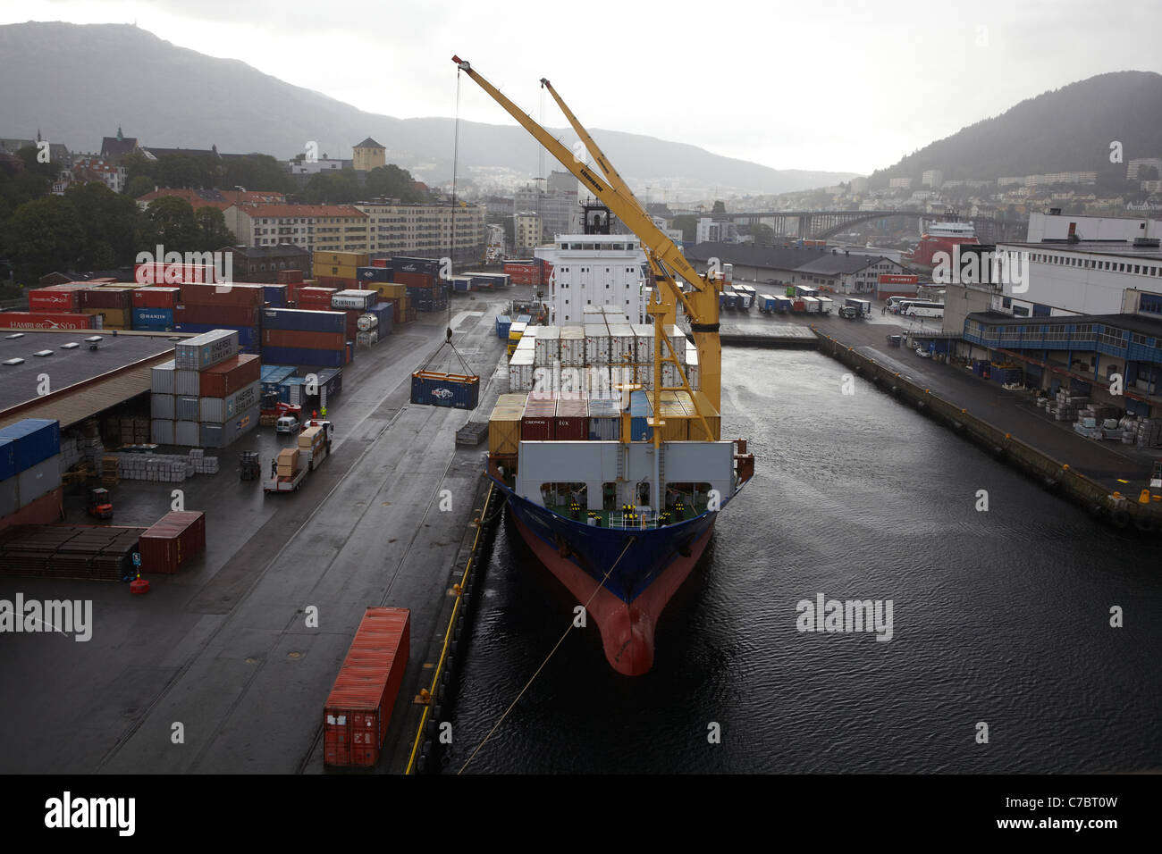 Freight containers being loaded onto the cargo container ship, MV ...