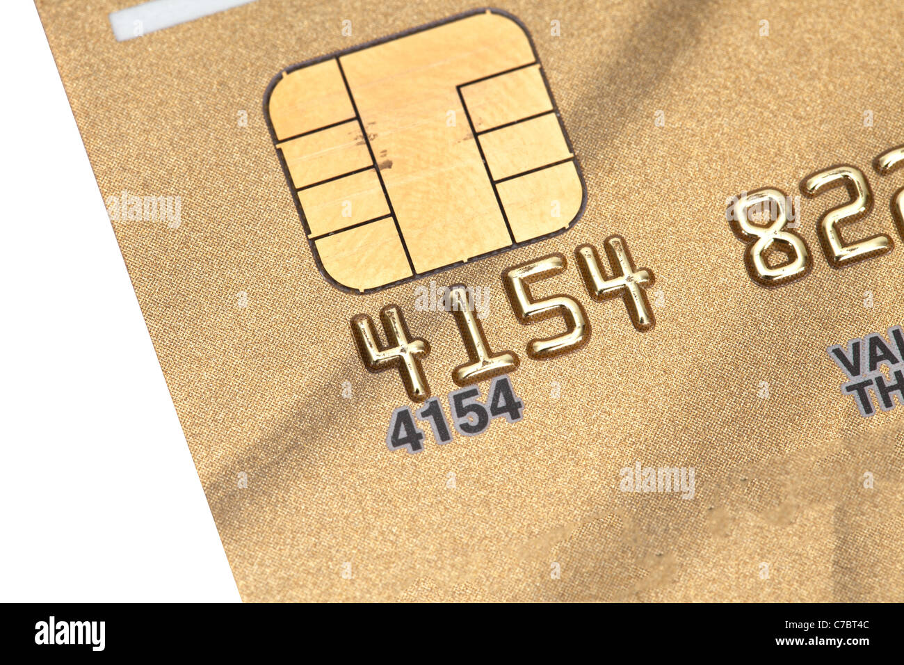 Macro view of golden debit (credit) card with numbers Stock Photo - Alamy