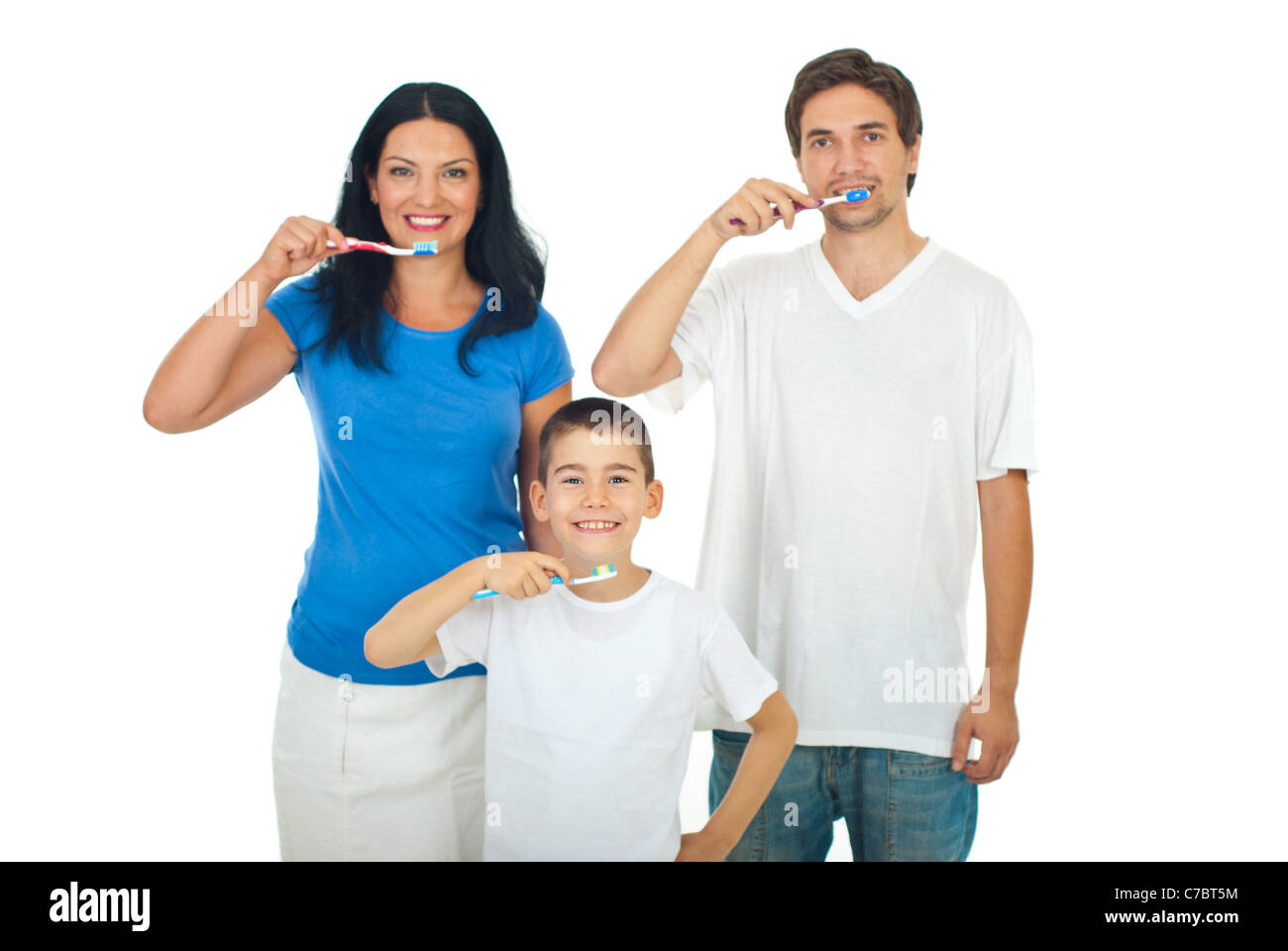 Healthy family brushing teeth isolated on white background Stock Photo ...