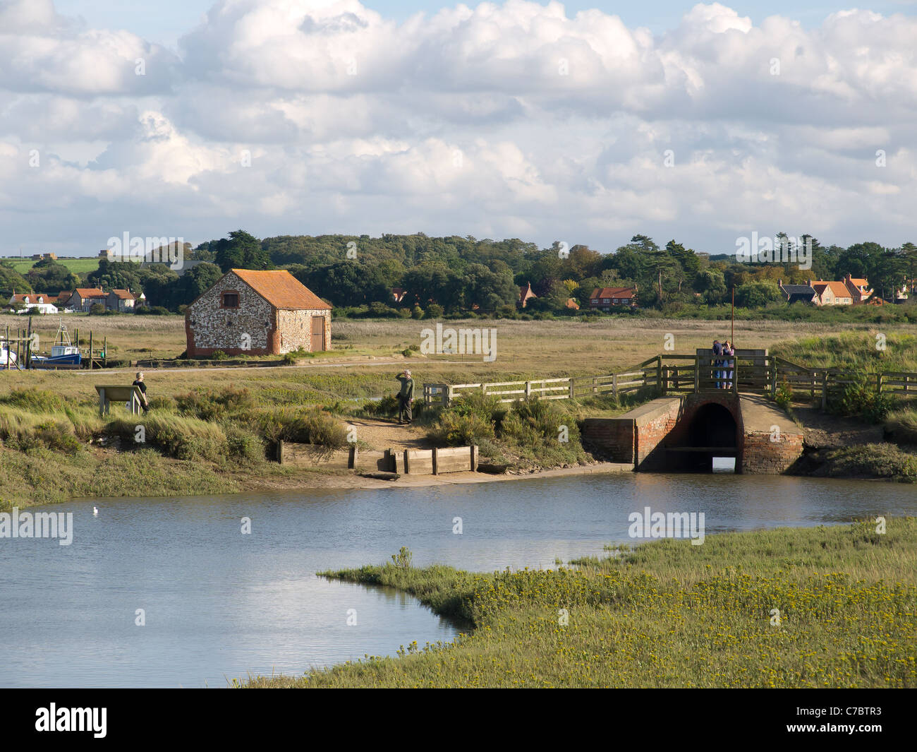 Thornham Village with the Old Coal Barn seen from the Holme Nature ...
