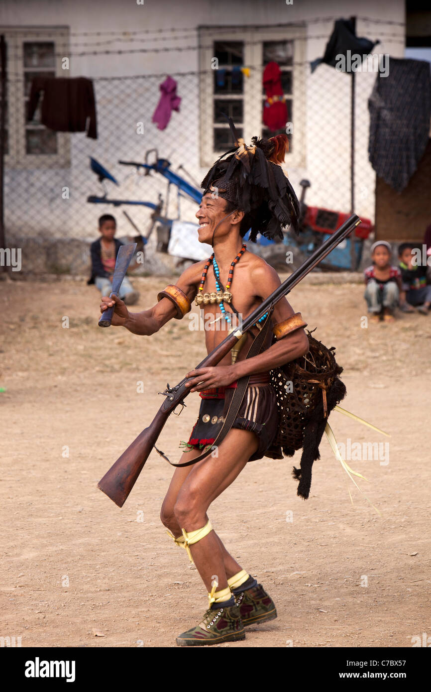India, Nagaland, Longwa, Konyak Naga warrior in traditional dress ...