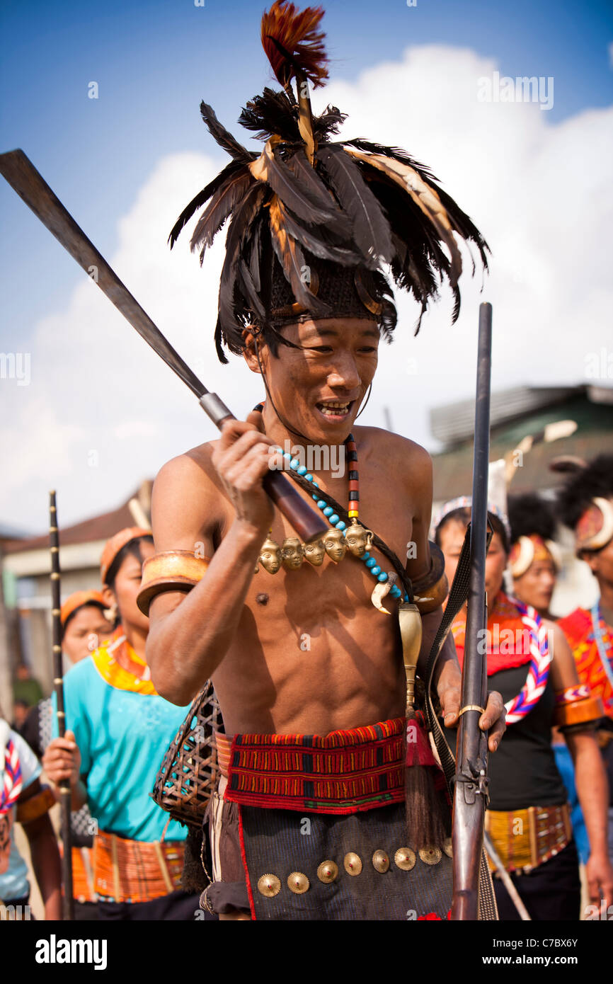 India, Nagaland, Longwa, Konyak Naga warrior in traditional dress ...