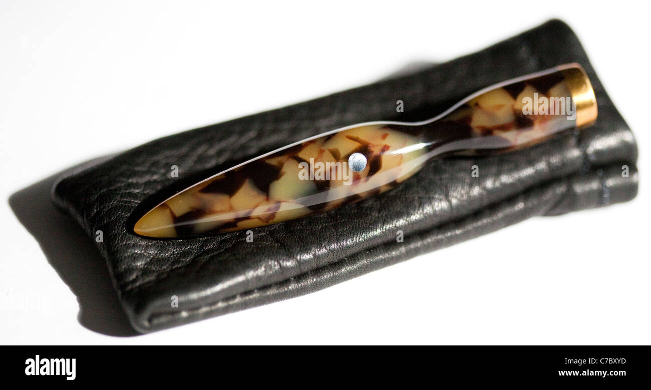 A custom made pipe tamper Stock Photo - Alamy