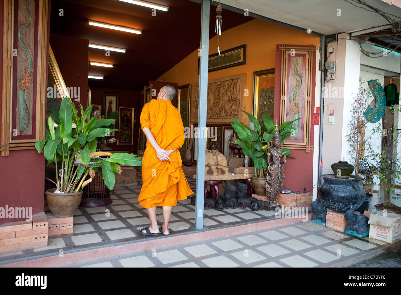 Curious Monk at Art Shop, Chiang Mai, Thailand Stock Photo - Alamy