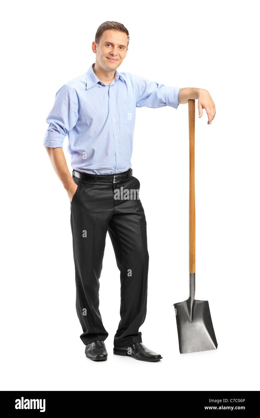Man holding a shovel hi-res stock photography and images - Alamy