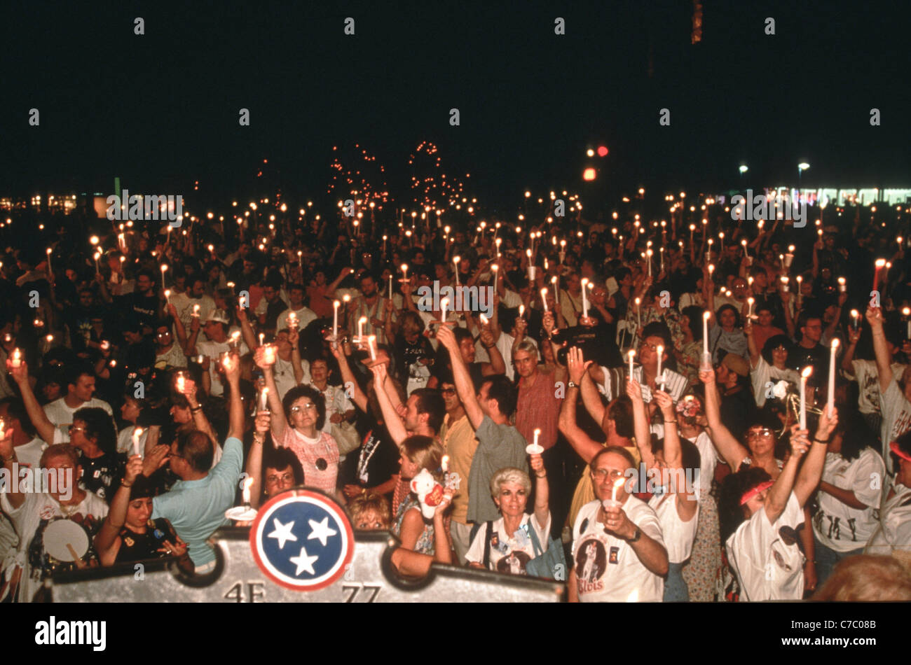 Thousands of Elvis Presley fans hold a candlelight vigil to mark the ...