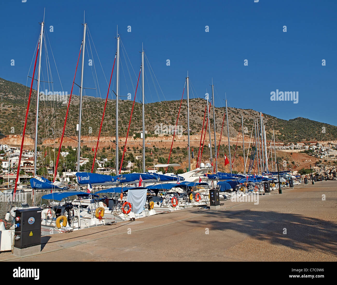 A flotilla of Sunsail yachts in the harbour at Kalkan, Antalya Turkey ...