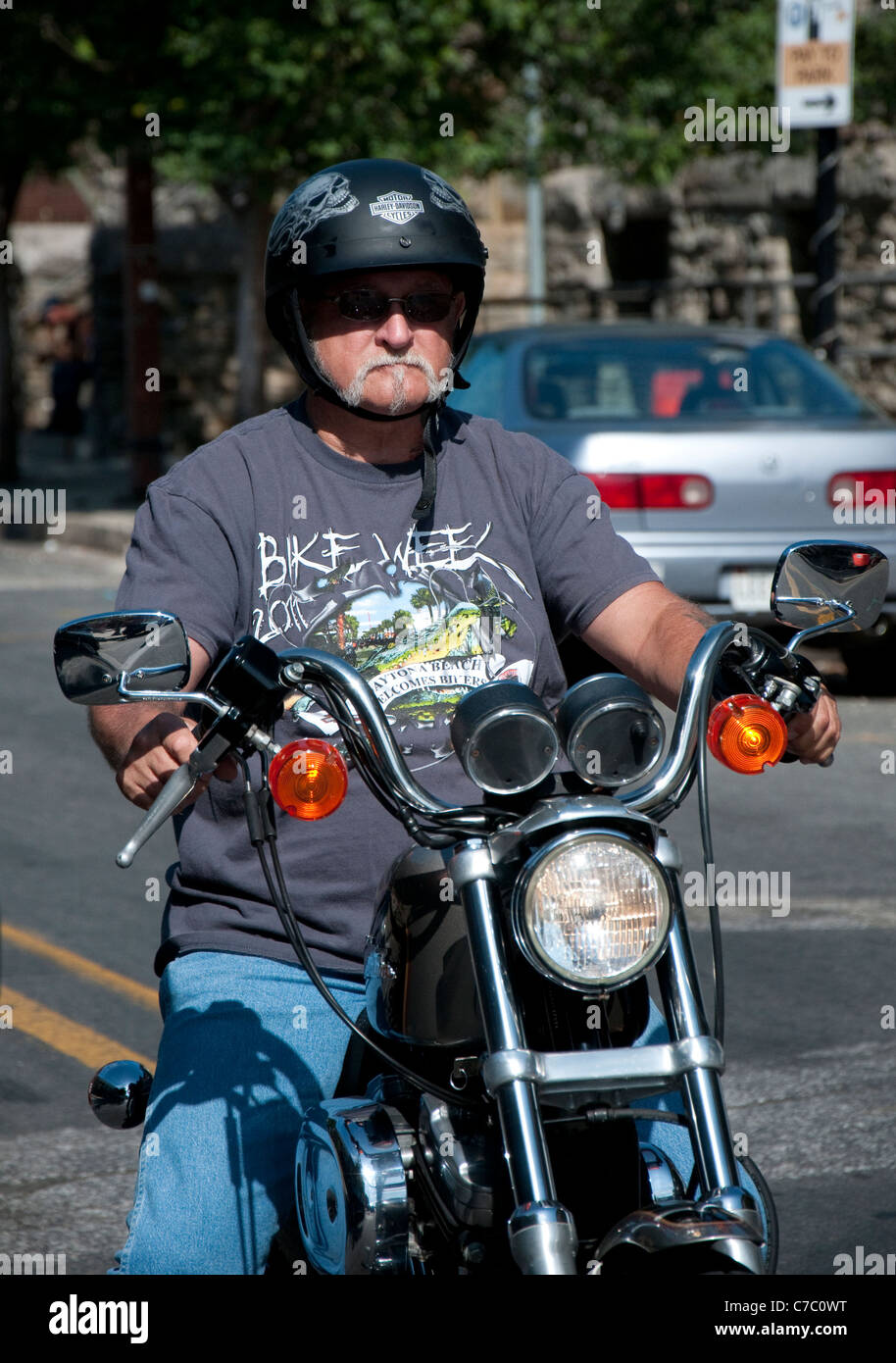 A motorcyclist riding through Baltimore Maryland USA Stock Photo - Alamy