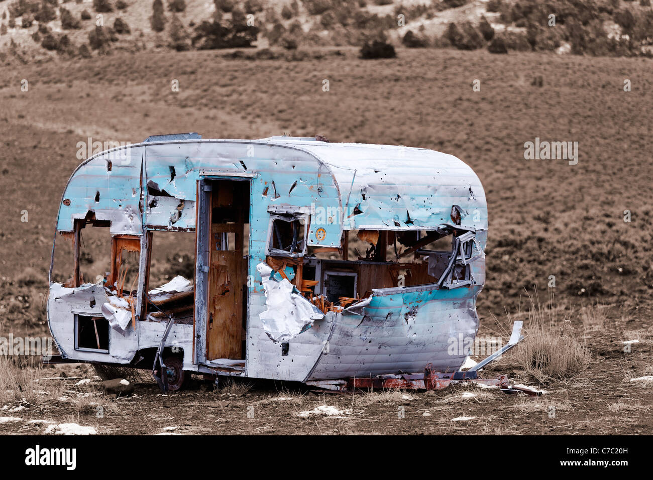 Shot up camping trailer Stock Photo - Alamy