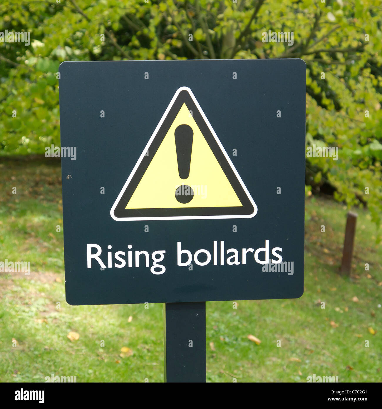 Warning sign for Rising Bollards which may block vehicle entry or exit ...