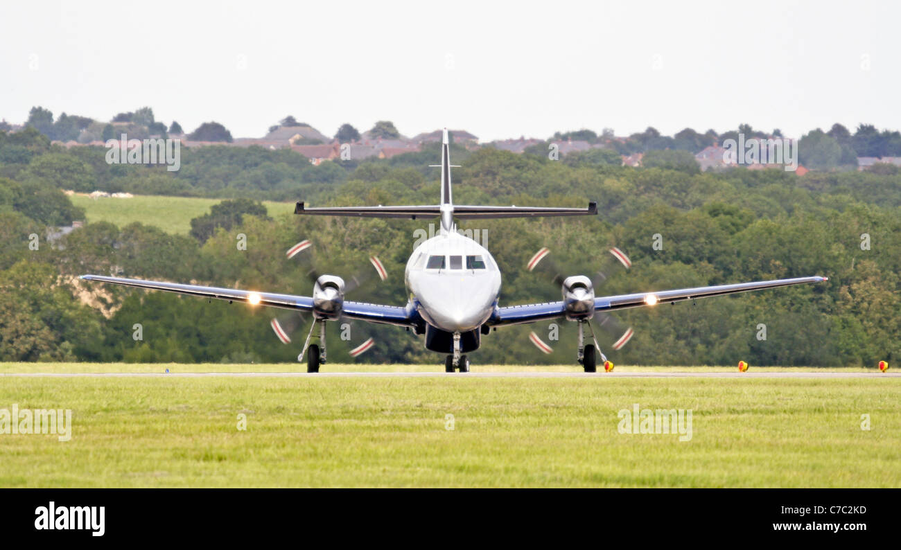 Aircraft lined up on the runway, preparing for takeoff. The Jetstream ...