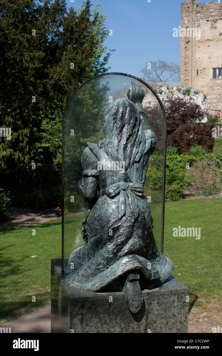 Bronze sculpture of Alice through the looking glass, Castle grounds ...