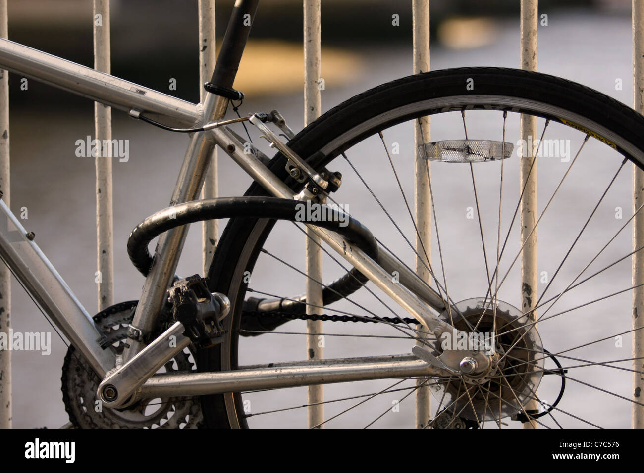 Locked cycle to railings hi-res stock photography and images - Alamy