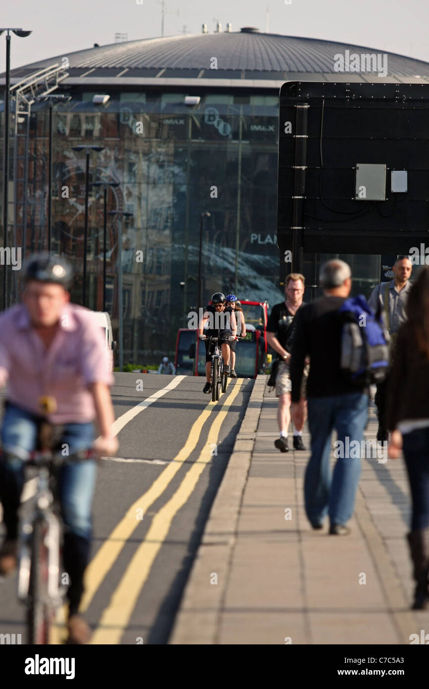 cyclists and pedestrians crossing Westminster Bridge in London Stock ...