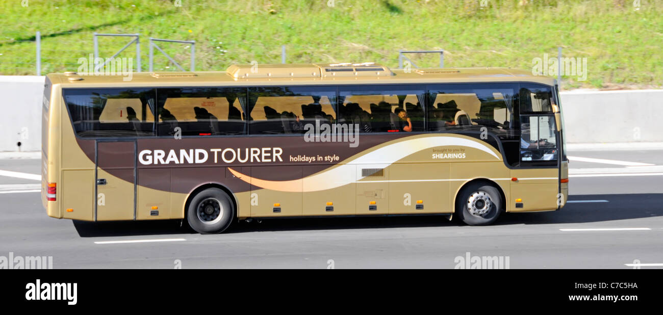 Graphic design on side view of Shearings tour company holiday coach ...