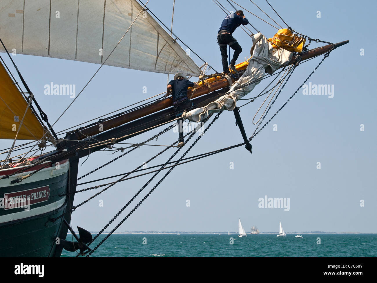 Working in the bowspirit. French Tall ship Etoile de France, Bay of ...