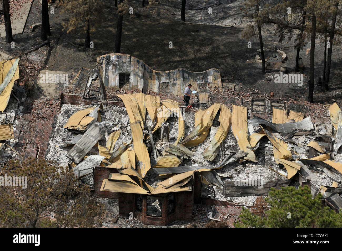 Aerial of homes destroyed by wildfire that burned through a heavily ...