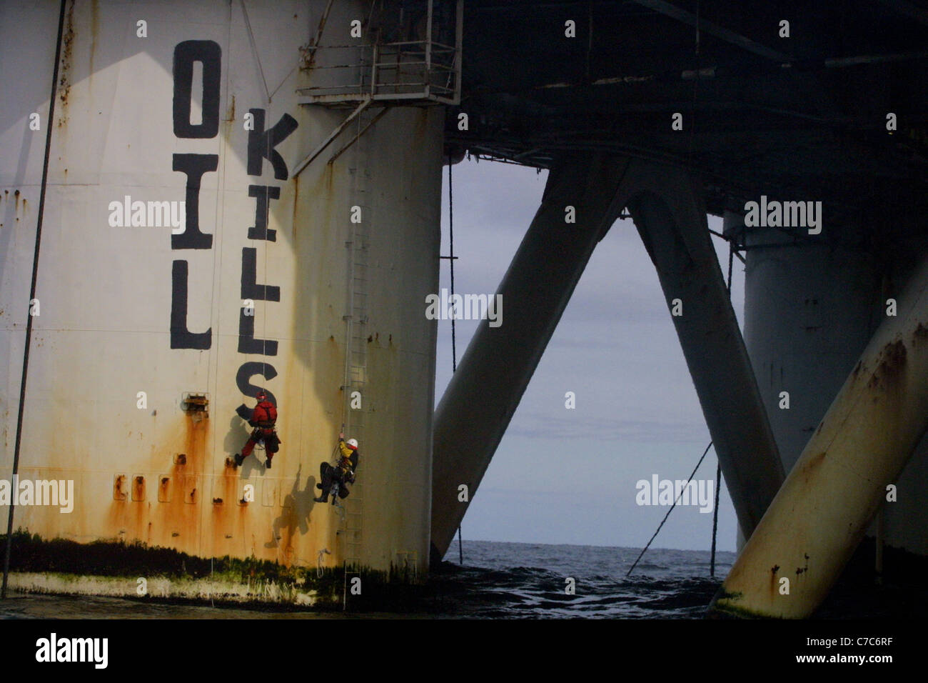 Six Greenpeace activists protest against drilling for oil, on a rig in ...