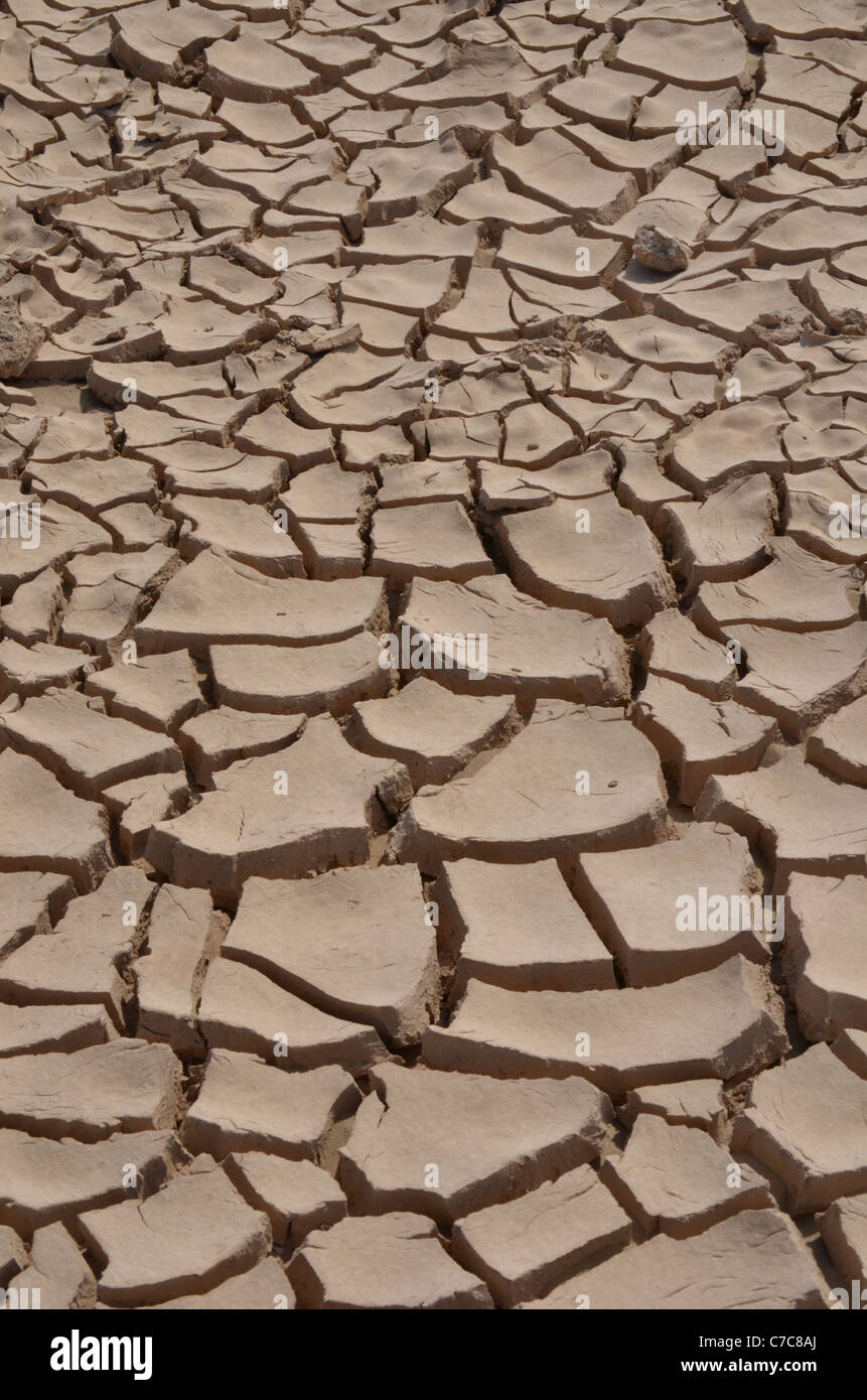 Dried, cracked mud in the desert at Yadan National Park, near Dunhuang ...