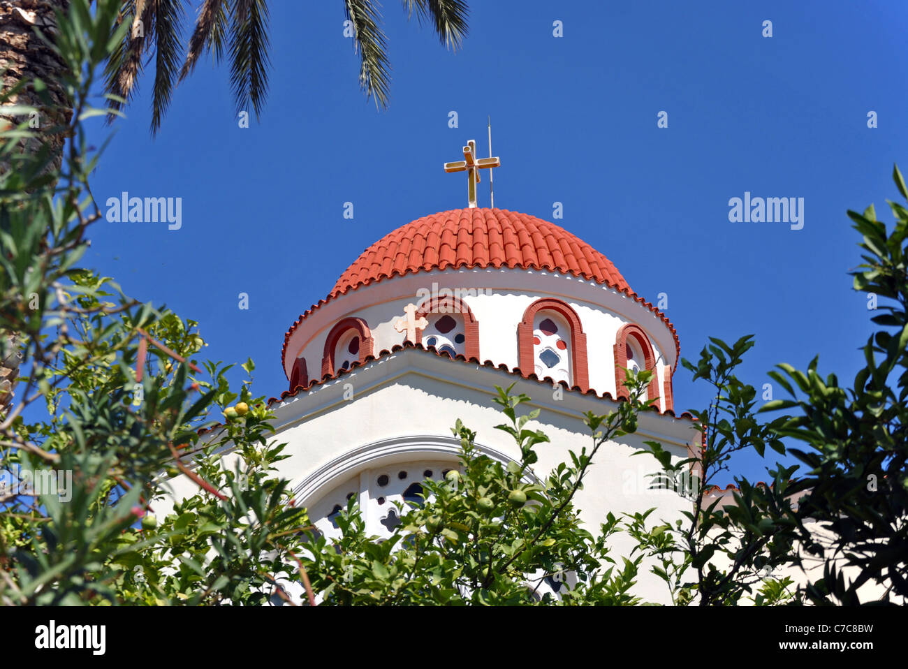 Greek Orthodox Church through the trees Stock Photo - Alamy