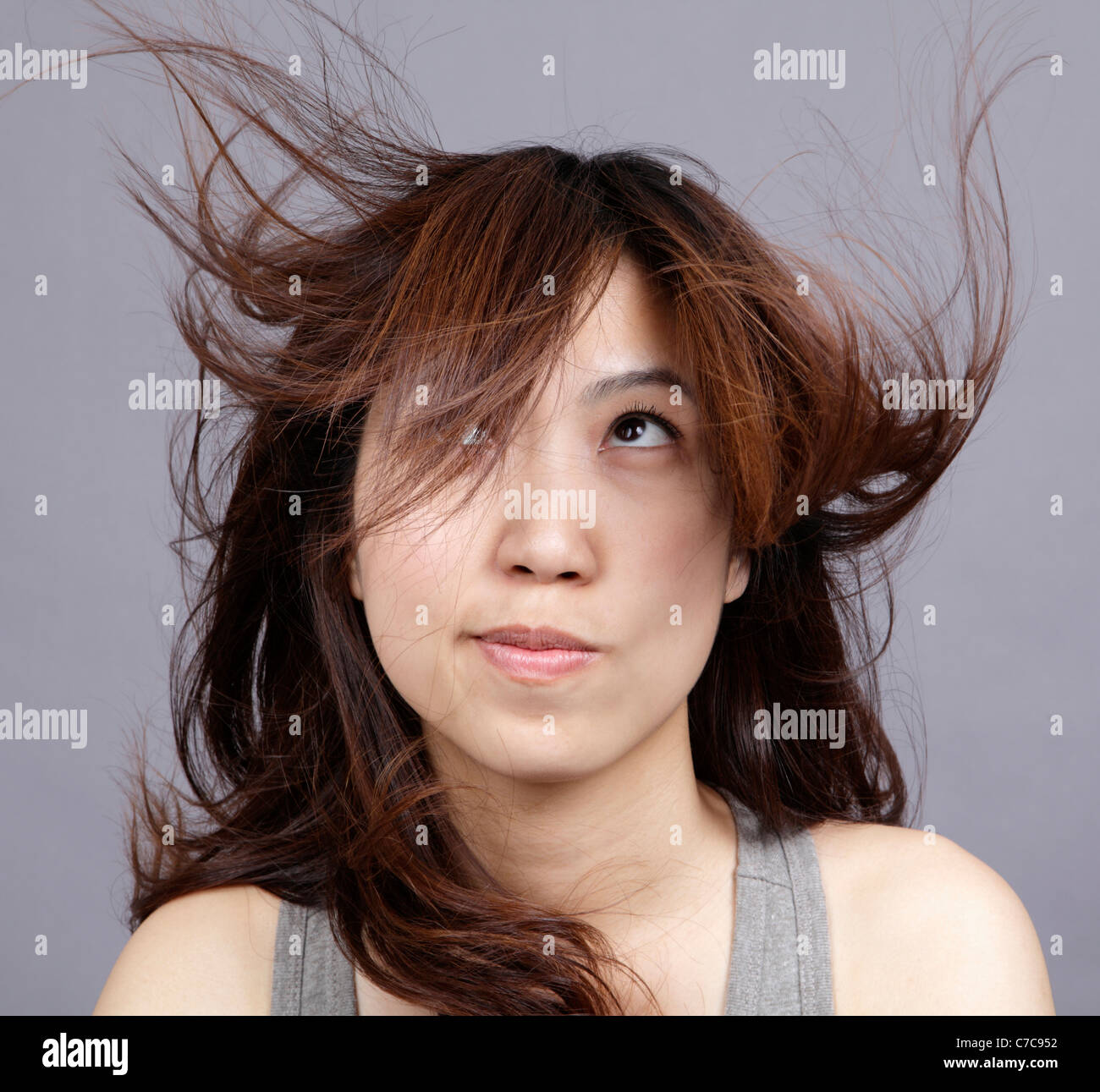 The hair of girl has floated by wind Stock Photo - Alamy