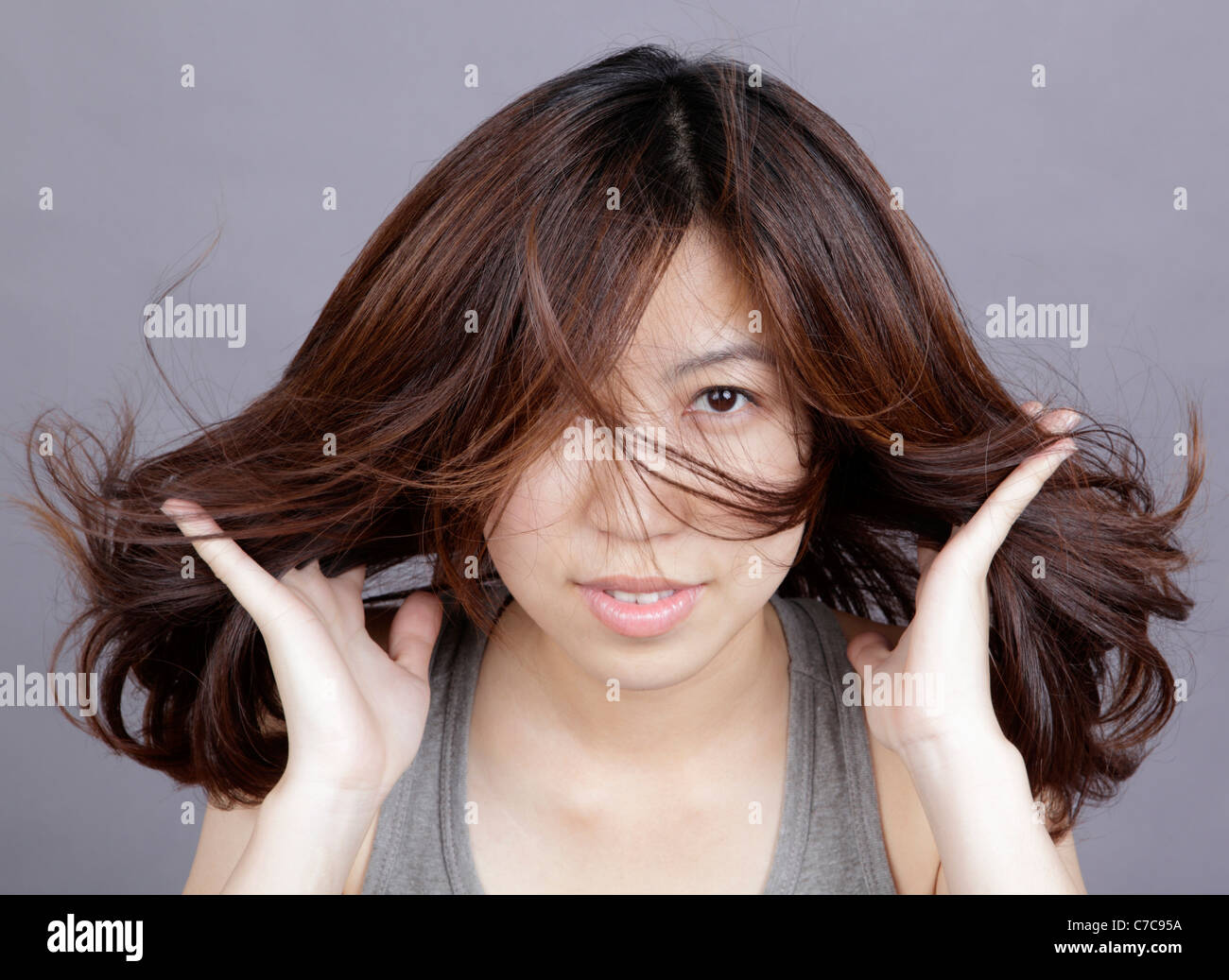 The hair of girl has floated by wind Stock Photo - Alamy