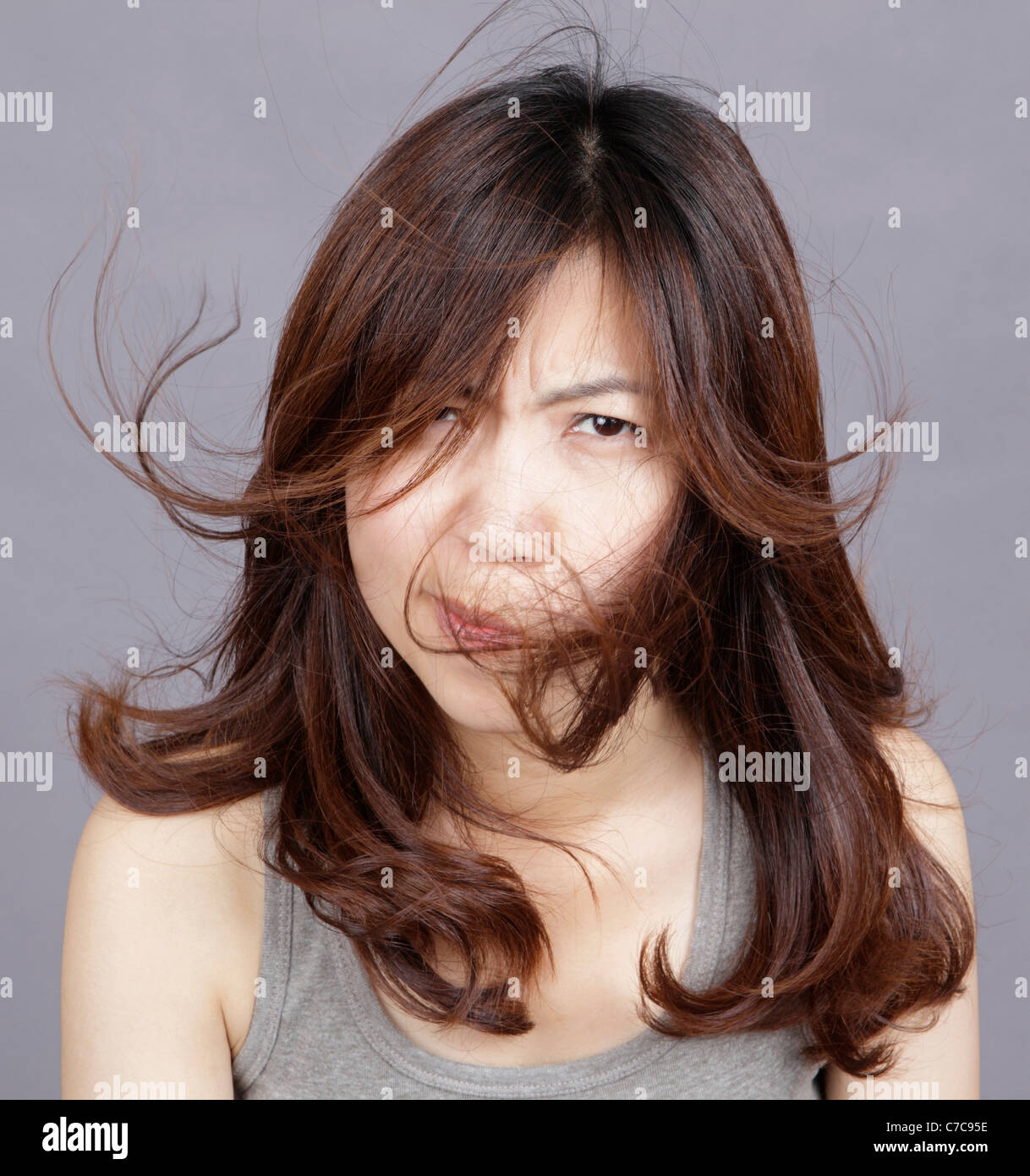 The hair of girl has floated by wind Stock Photo - Alamy