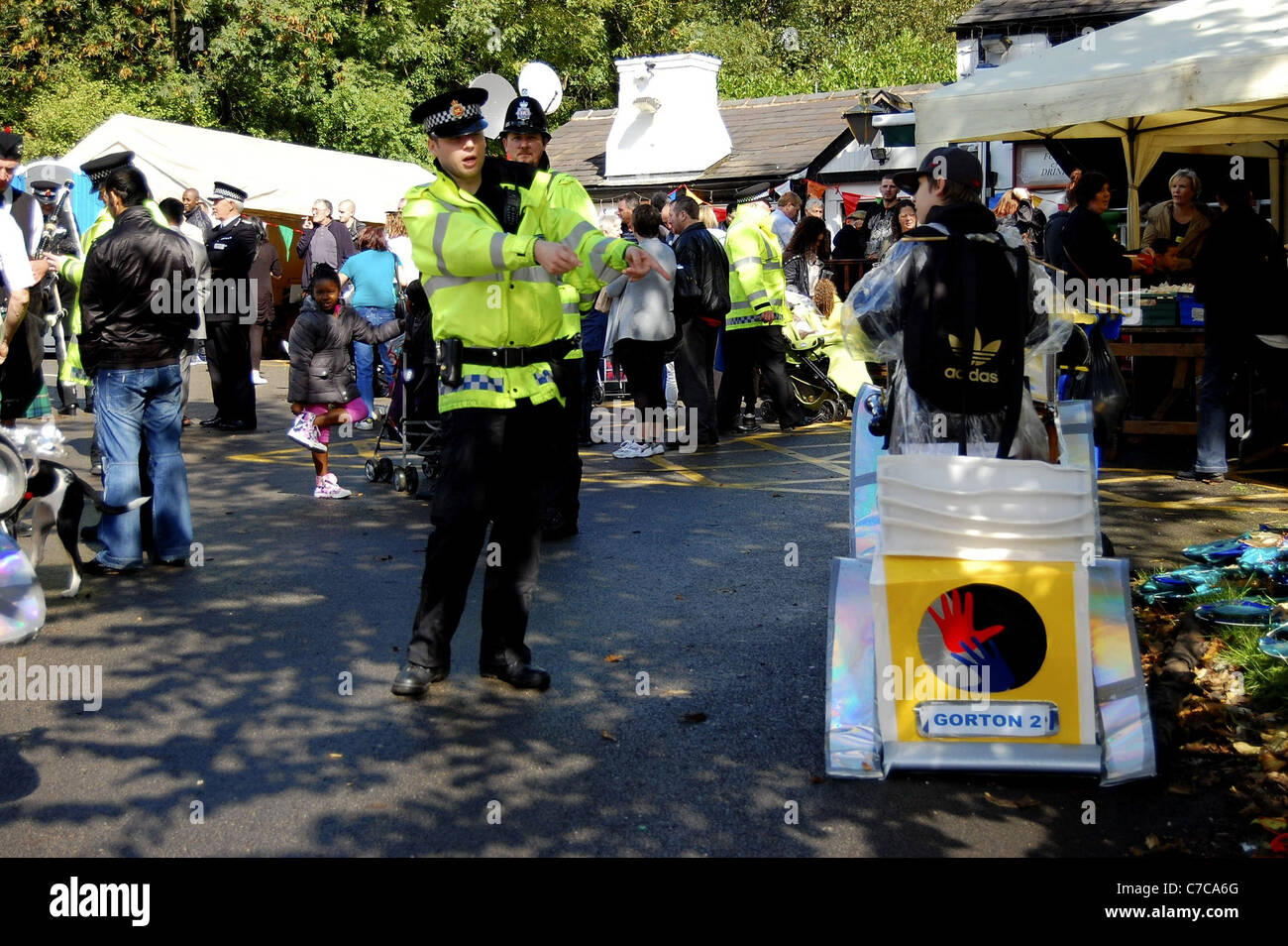 police officer 'directing' model float car to parking position after ...