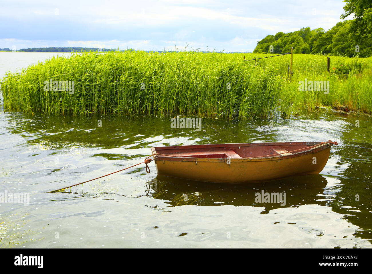 Fishing boat on the lake Stock Photo - Alamy