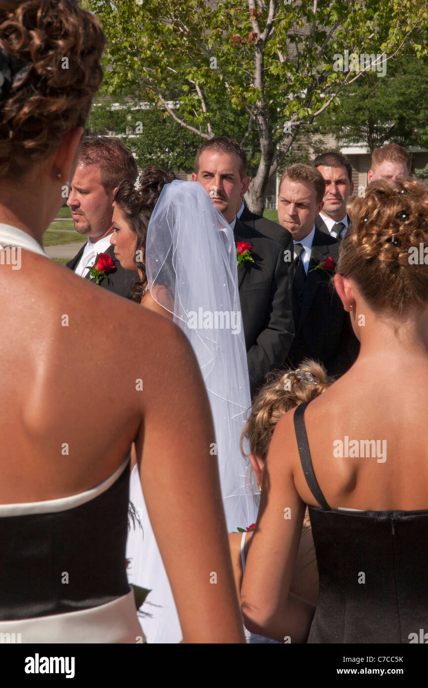 American wedding ceremony with couple a groom and bride with ...